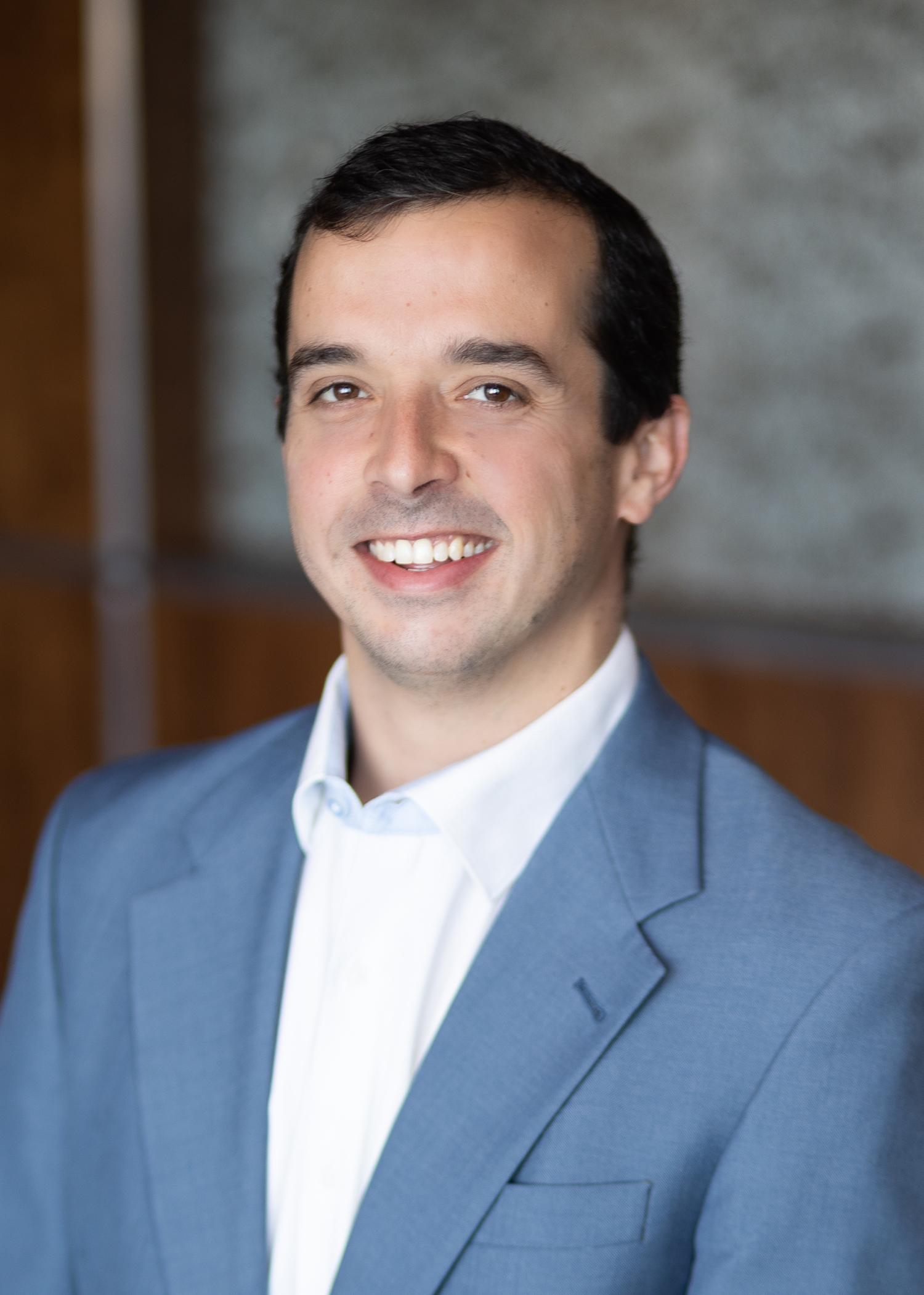 Christopher Devine | S.L. Nusbaum Realty Co.